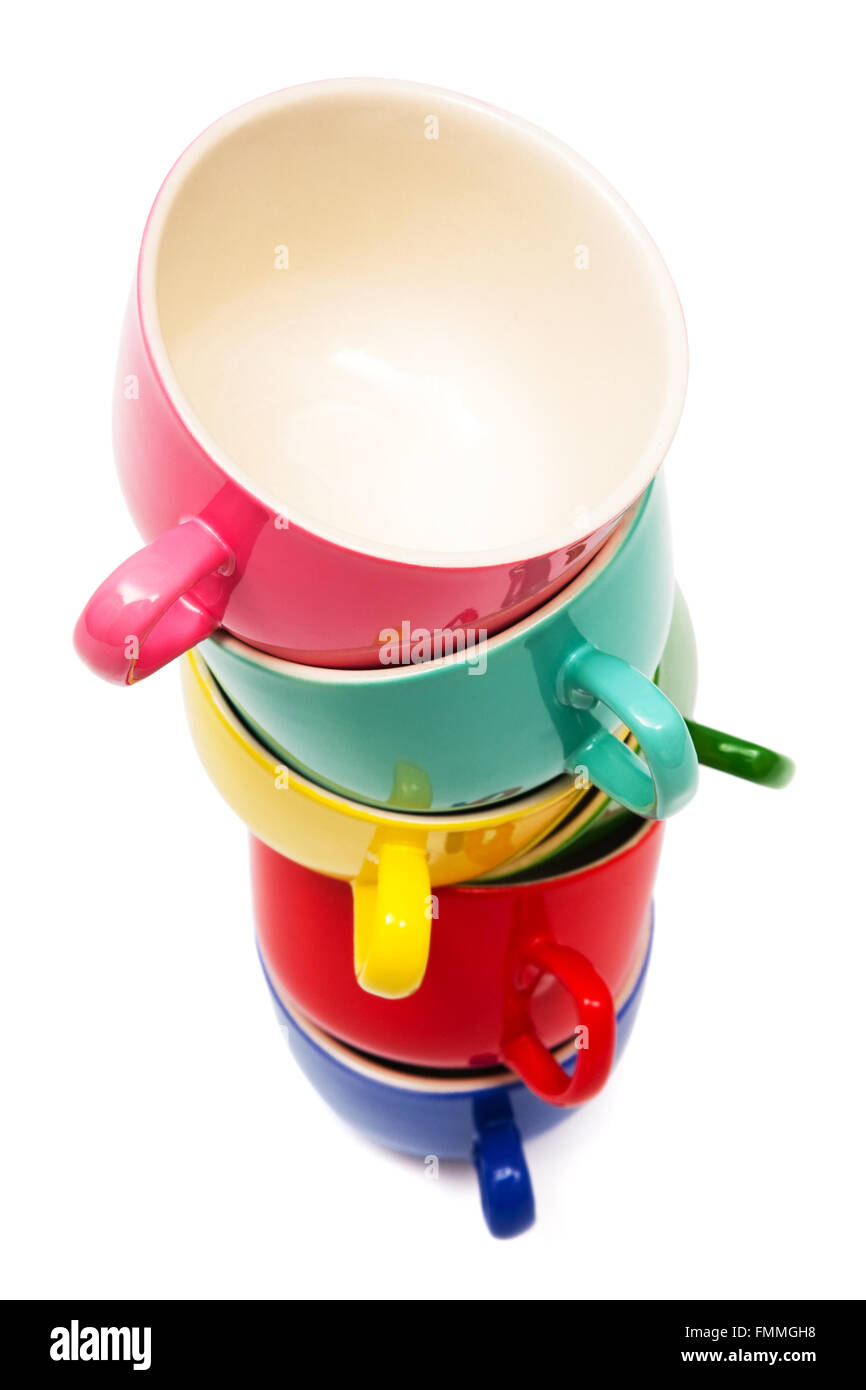 Beautiful color cups on a white background Stock Photo - Alamy