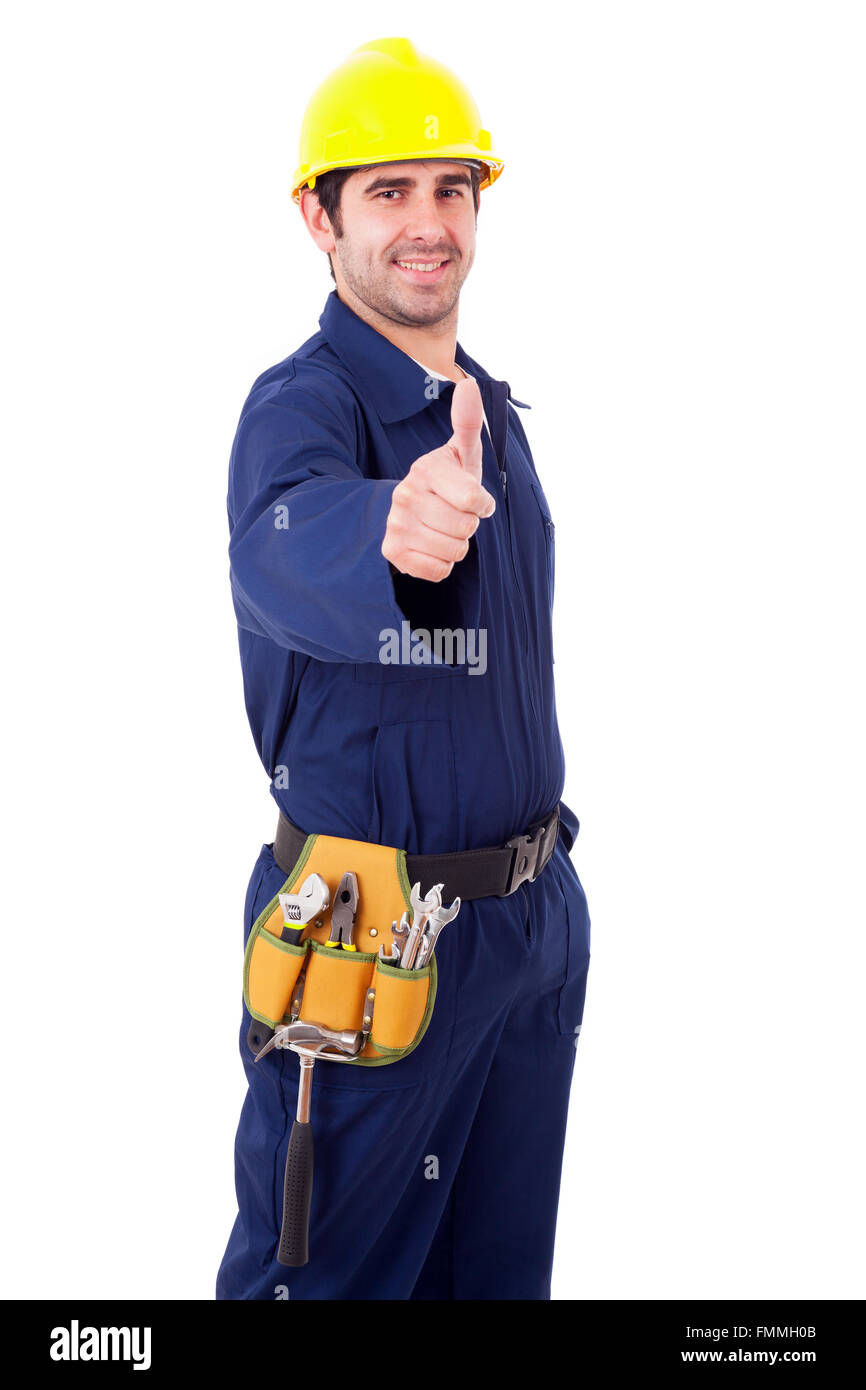 Smiling young builder thumbs up on white background Stock Photo - Alamy
