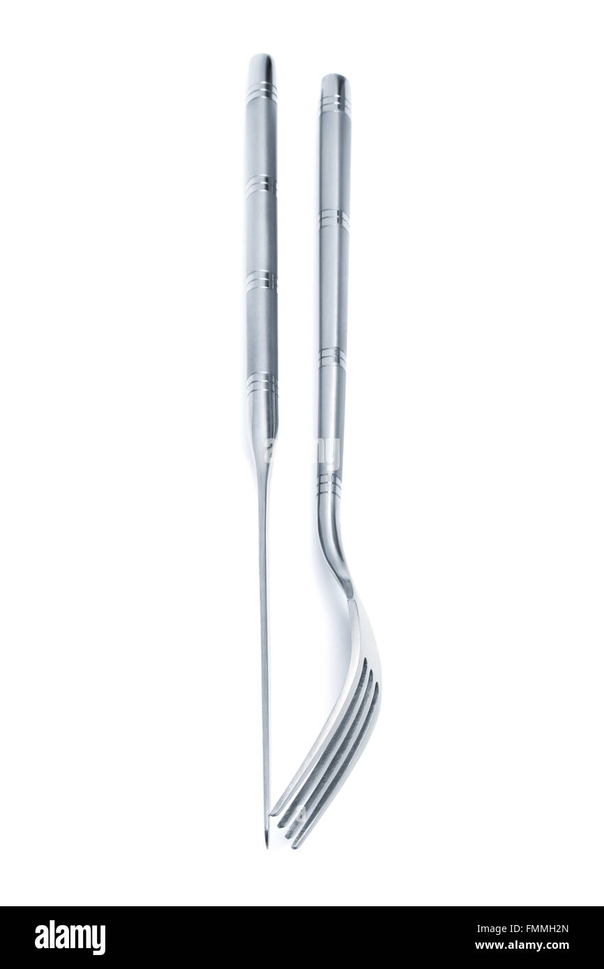 steel knife and fork on a white background Stock Photo - Alamy