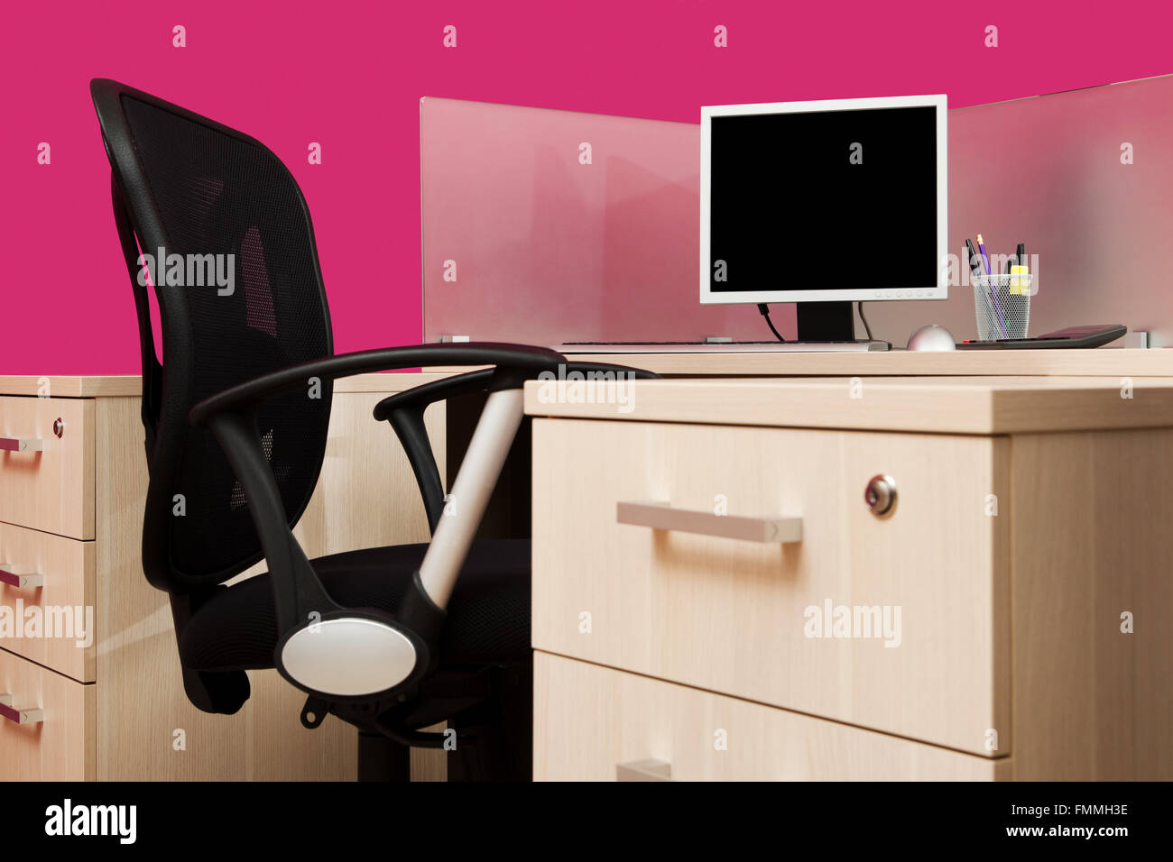 computers behind the glass in a modern office Stock Photo - Alamy