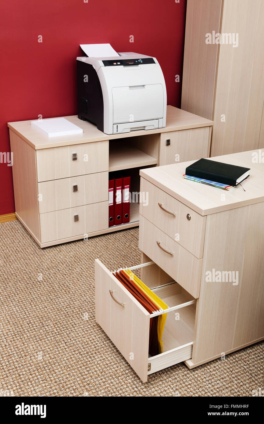 printer from the cabinet in a modern office Stock Photo - Alamy
