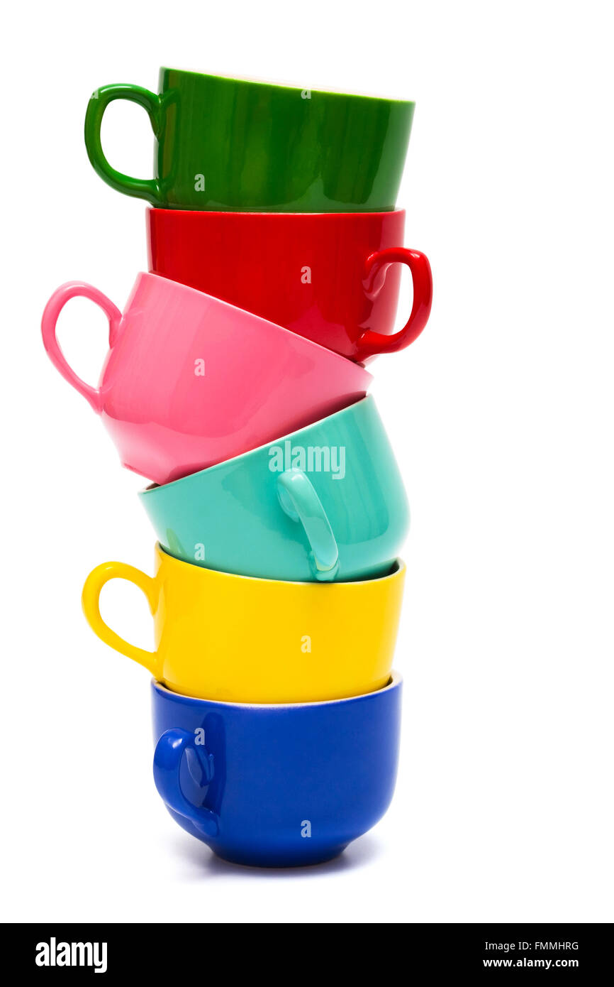 Beautiful color cups on a white background Stock Photo - Alamy
