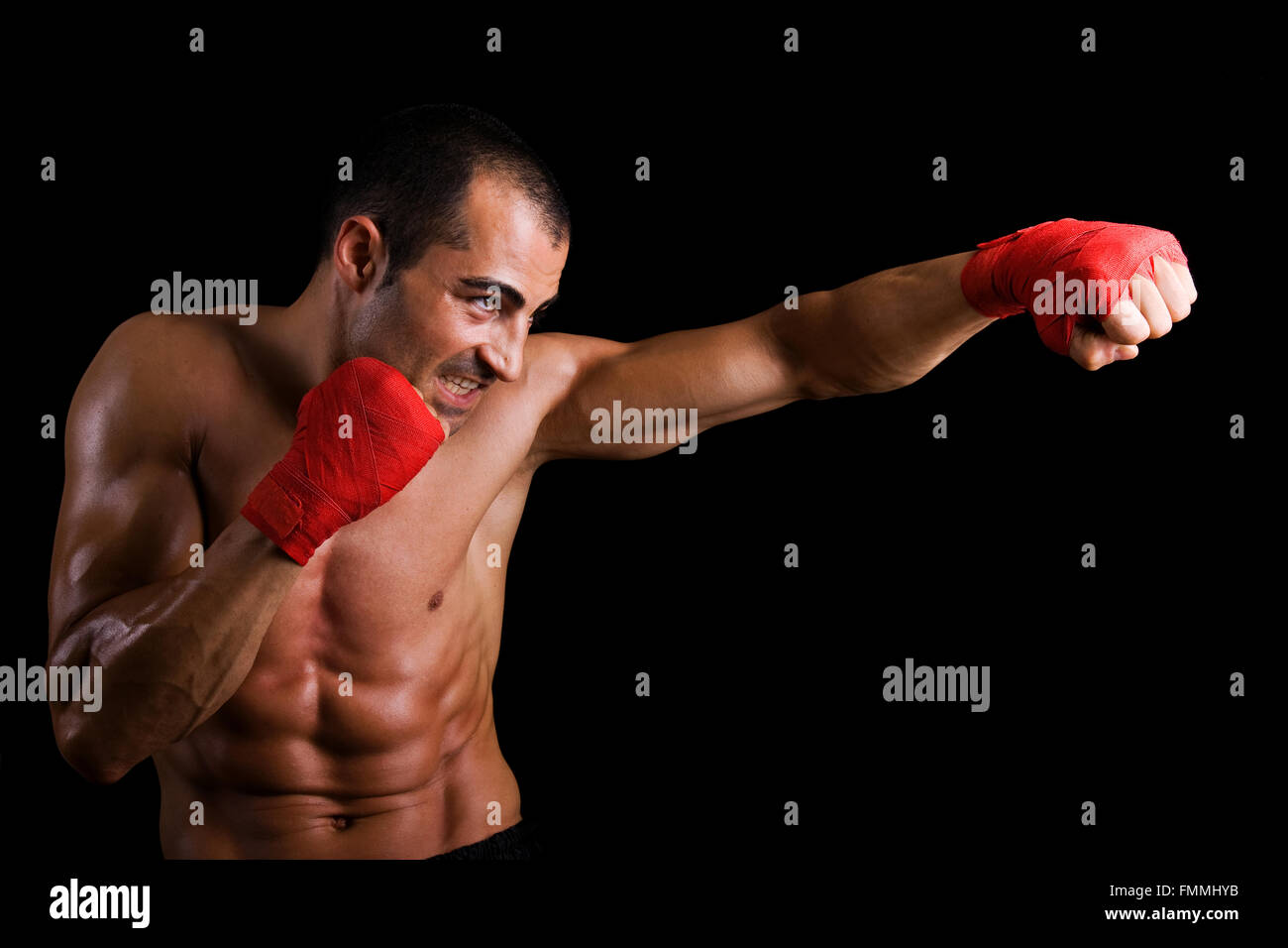 Young Boxer fighter over black background Stock Photo - Alamy