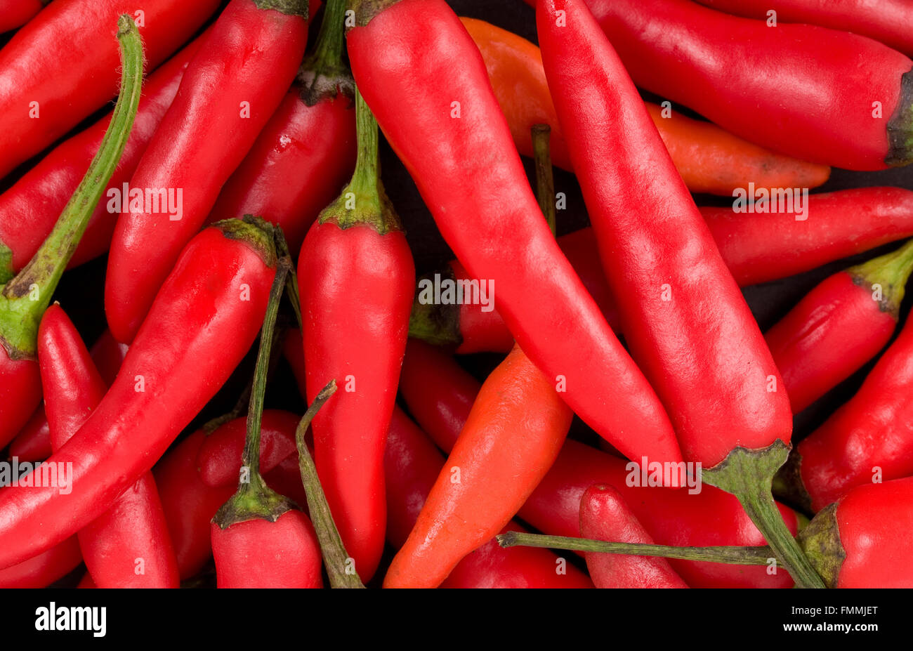 red chili peppers background Stock Photo - Alamy