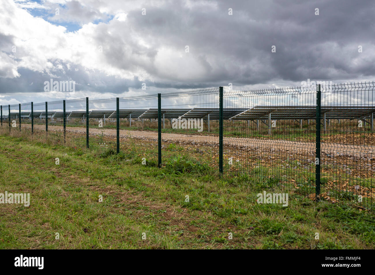 A solar farm behind a security fence Stock Photo - Alamy