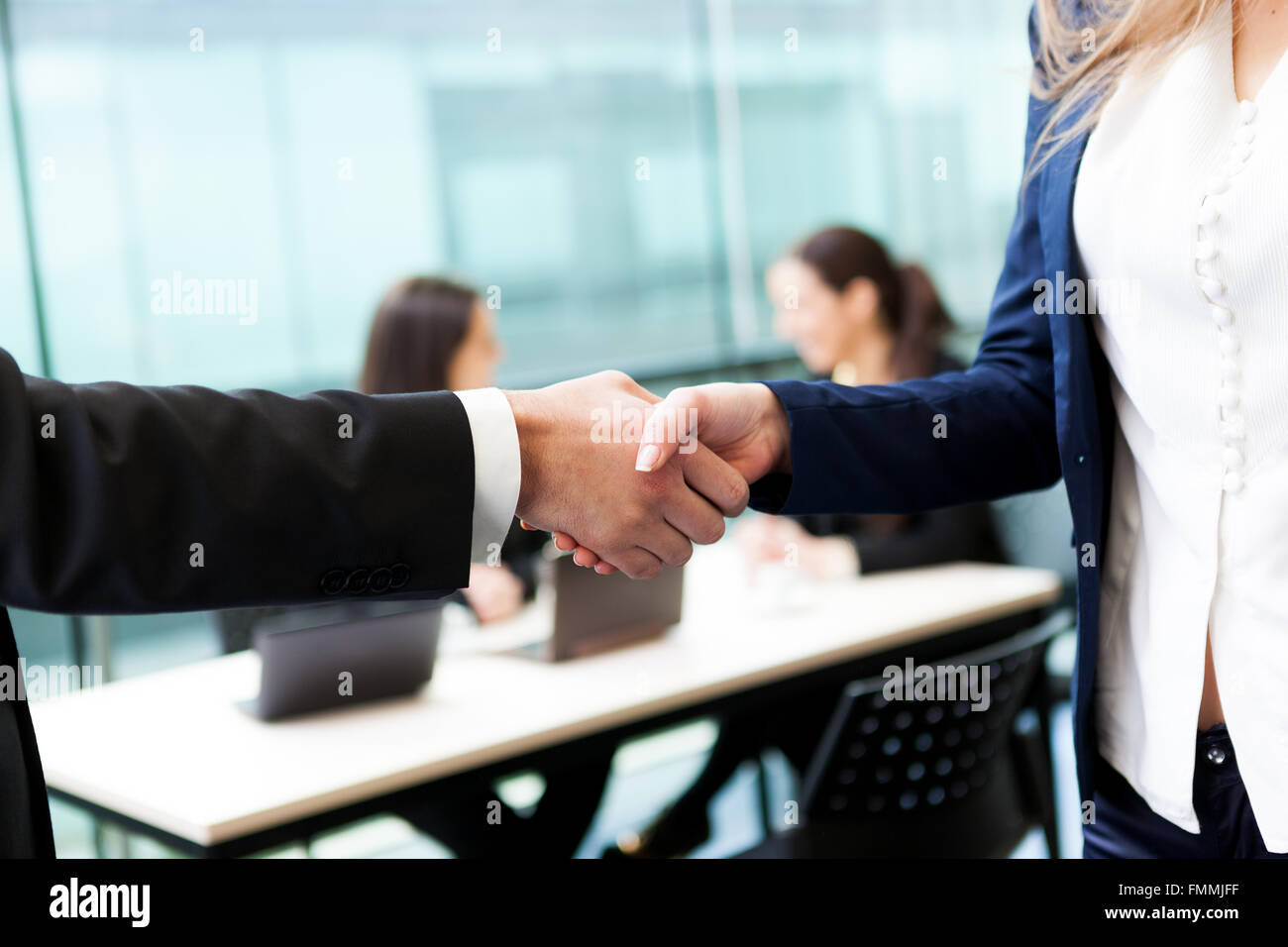 Business handshake at the office Stock Photo - Alamy