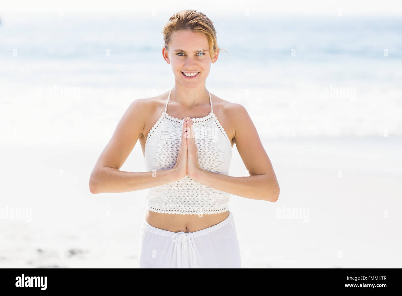 Portrait of beautiful woman in lotus position Stock Photo - Alamy