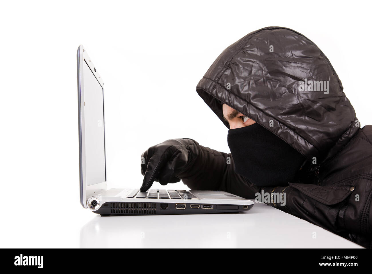 Computer Hacker stealing information from a laptop, isolated over white ...