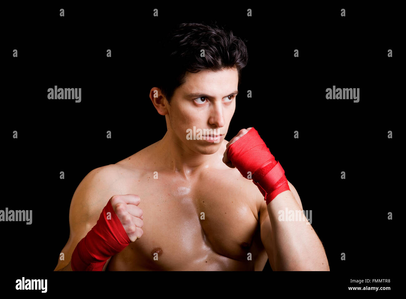 Young Boxer fighter over black background Stock Photo - Alamy