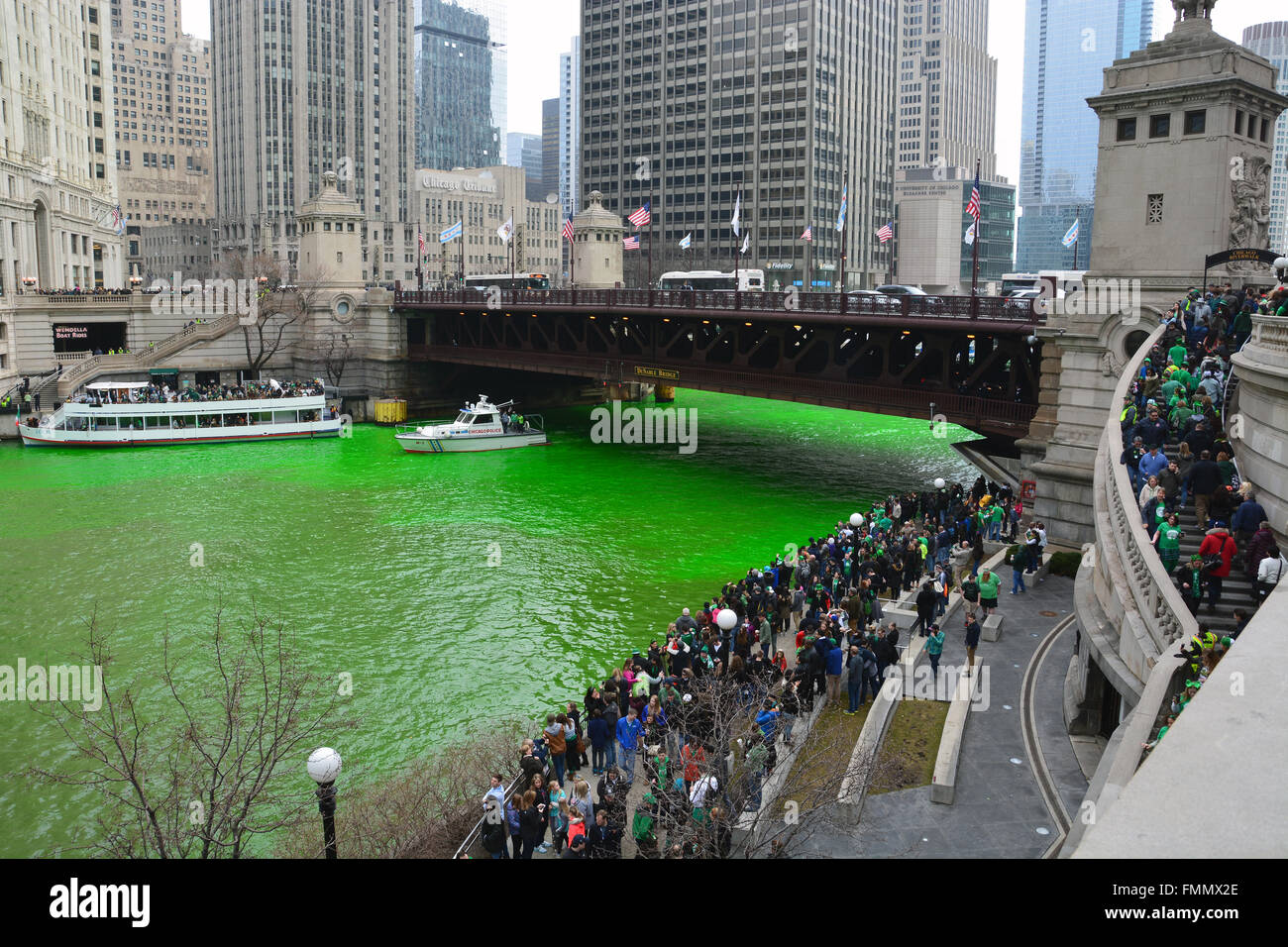 People watch the Chicago River being dyed green for St. Patrick's Day ...