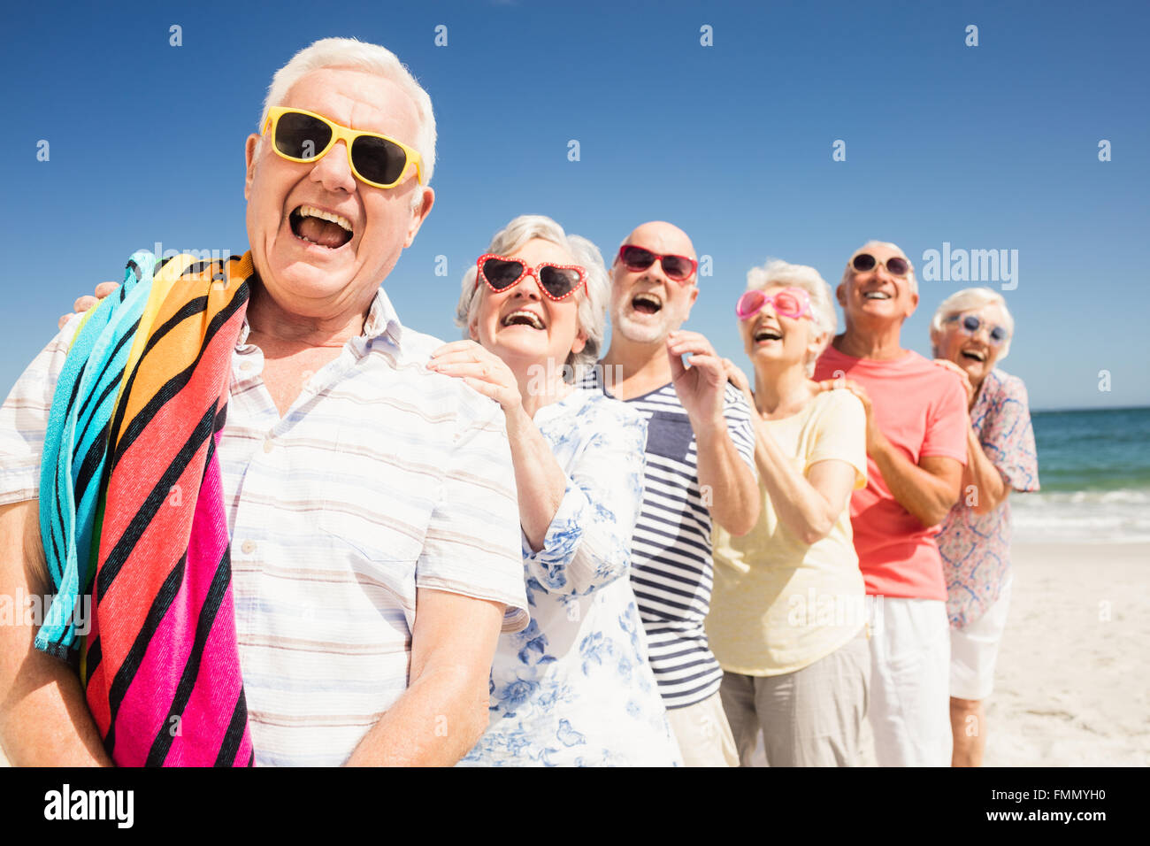 Portrait of smiling senior friends Stock Photo - Alamy