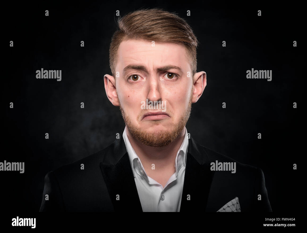 Handsome male model sad expression hi-res stock photography and images ...