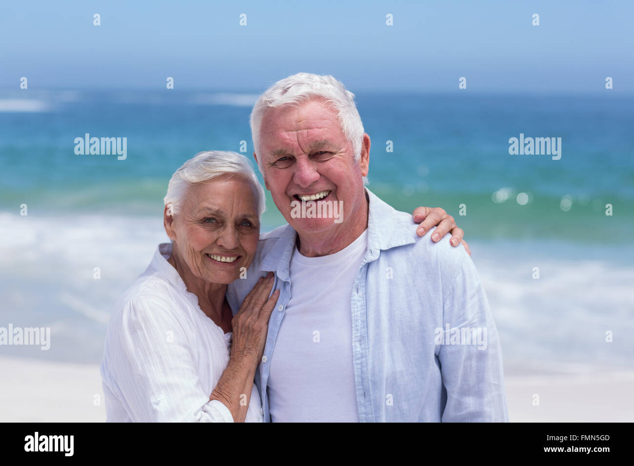 Senior couple smiling and posing Stock Photo - Alamy