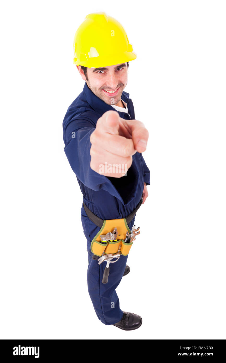 Full lenght of a smiling young builder pointing, isolated on white ...
