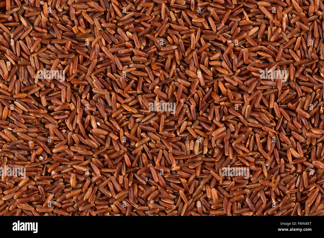close up of background of raw red rice Stock Photo - Alamy