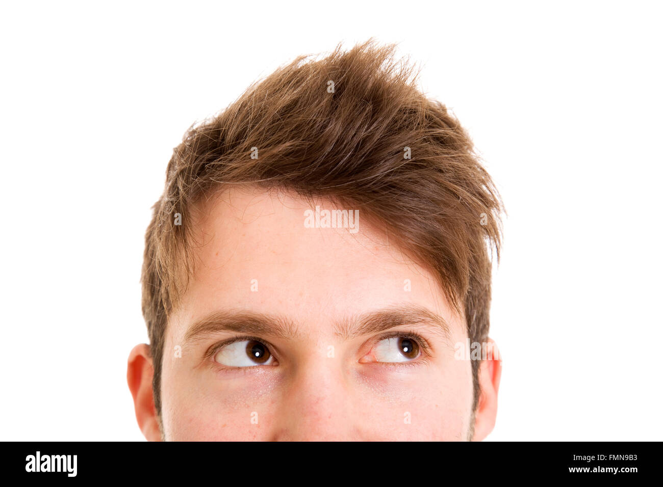 Young man looking up Stock Photo - Alamy