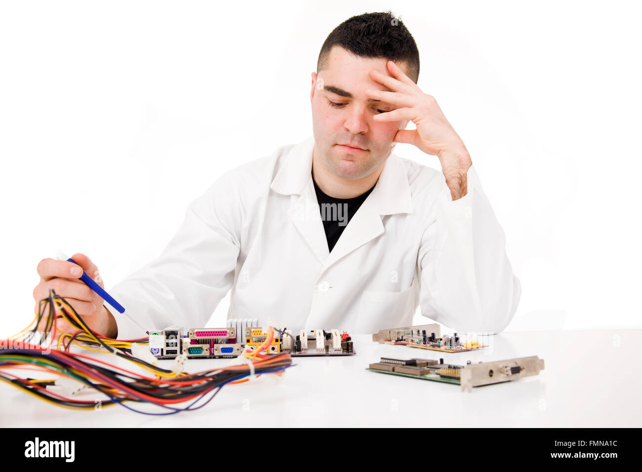 Pensive Computer Engineer on white background Stock Photo - Alamy
