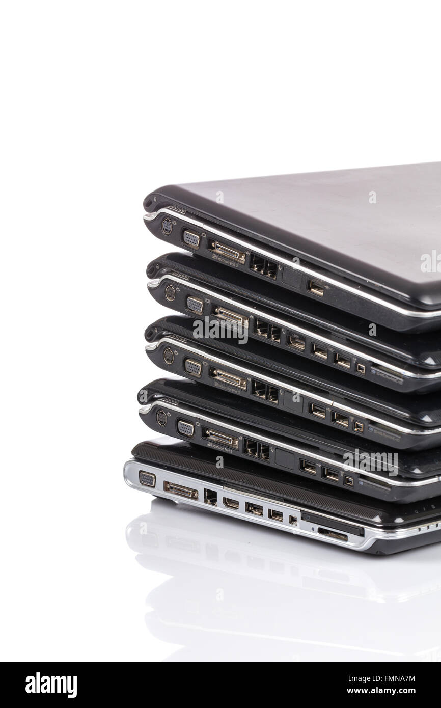 stack of old laptops awaiting repair isolated on white background Stock ...