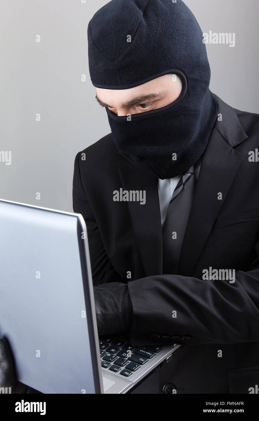 Computer Hacker in suit and tie Stock Photo - Alamy