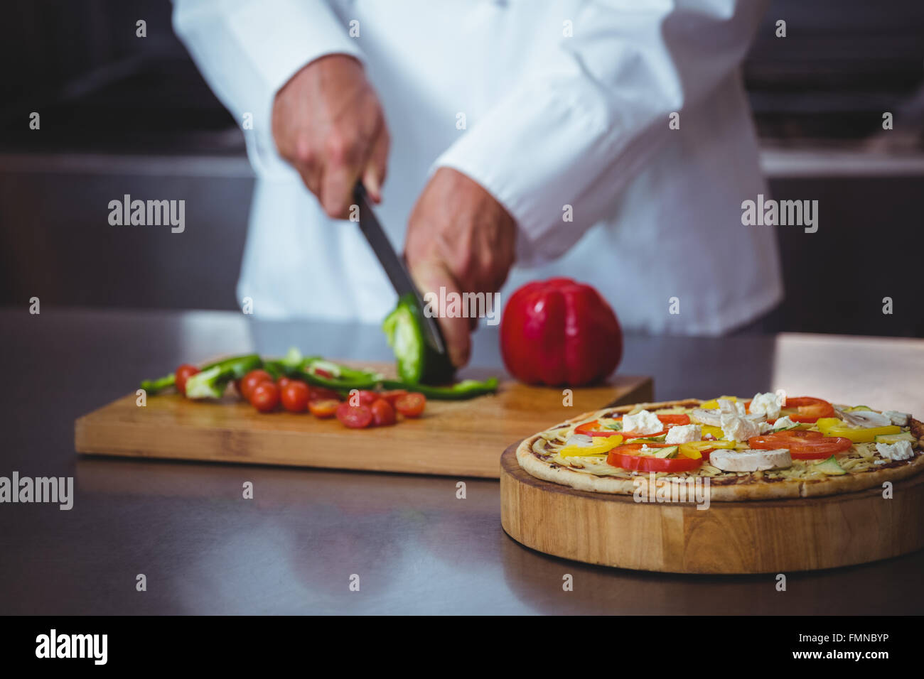 Chef slicing vegetables Stock Photo - Alamy
