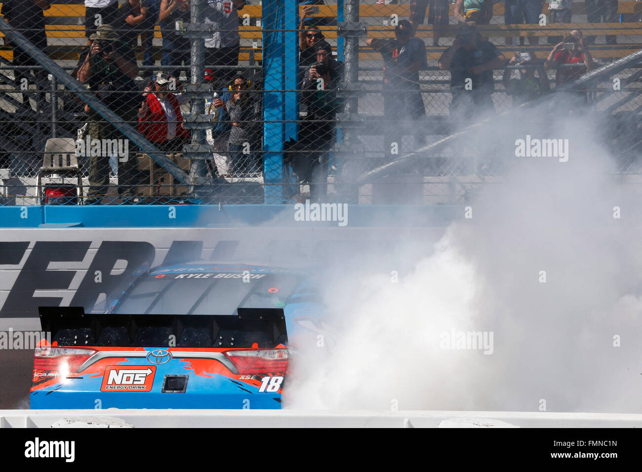 Avondale, AZ, USA. 12th Mar, 2016. Kyle Busch (18) wins the Axalta 200 ...