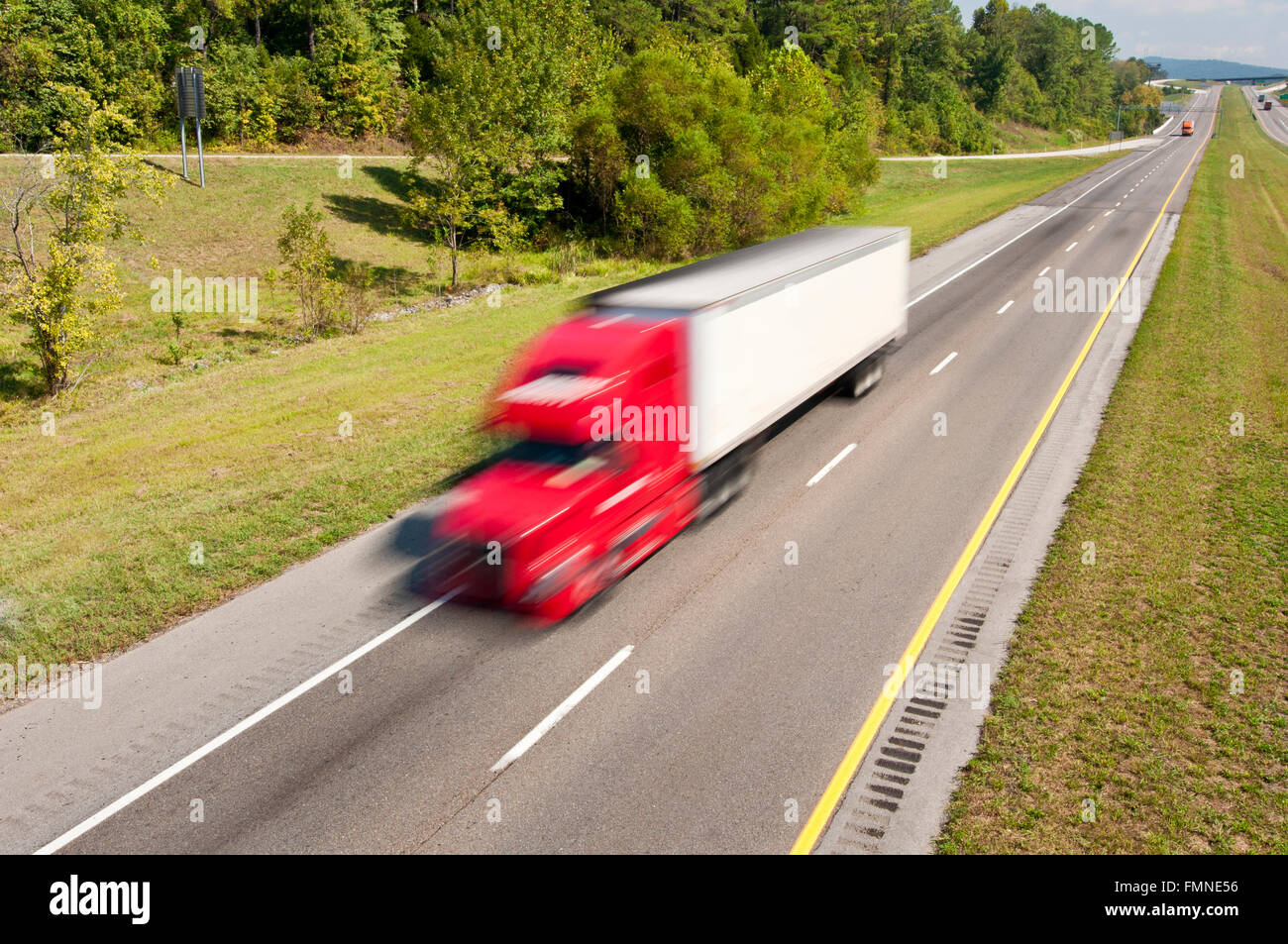 Semi Truck Speeding Down the Interstate Highway Stock Photo - Alamy Semi Truck Speeding Down the Interstate Highway Stock Photo - Alamy