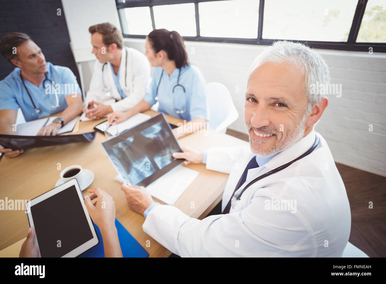 Happy radiologist holding x ray hi-res stock photography and images - Alamy