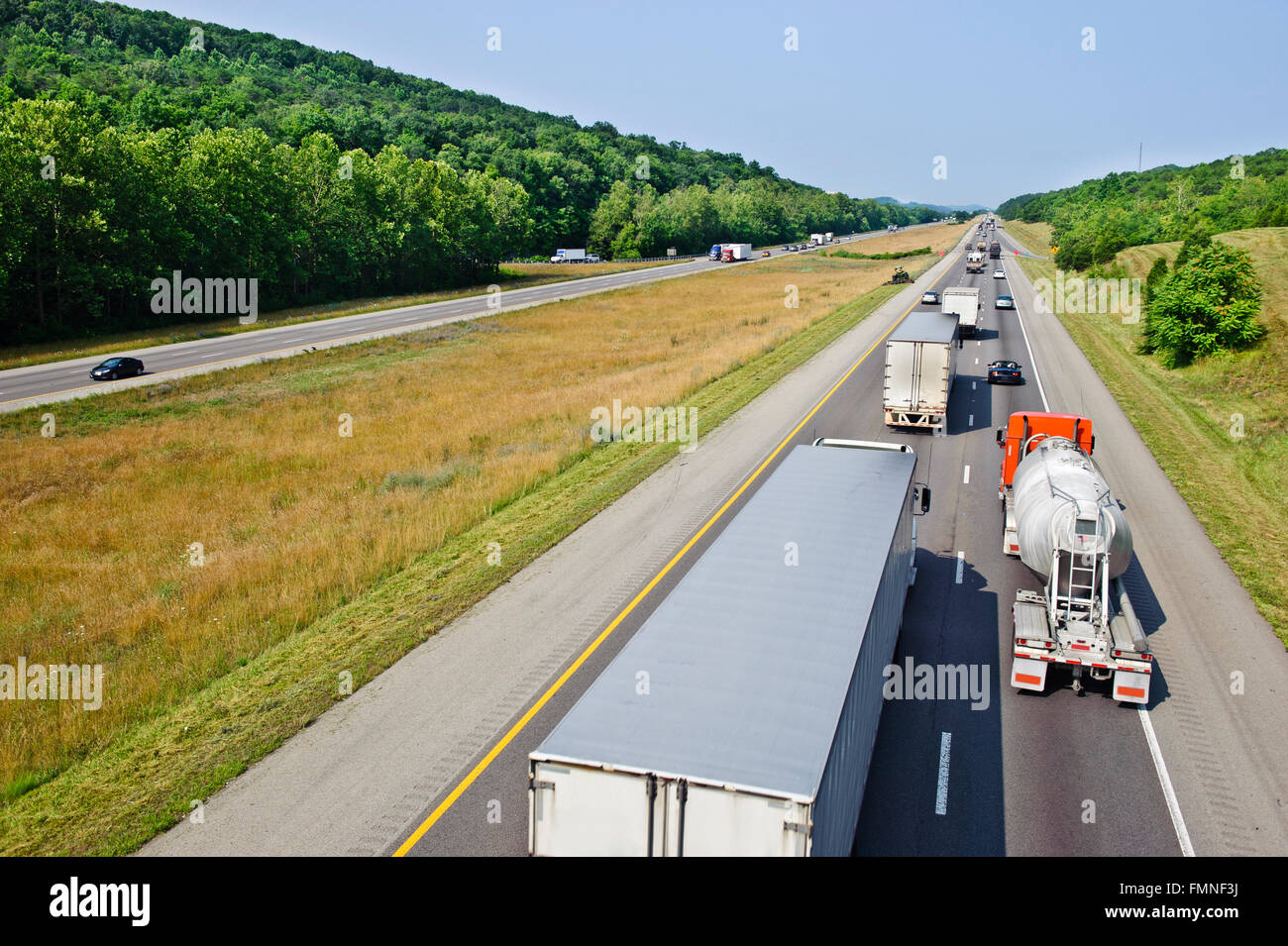 Trucks on the Interstate Highway Stock Photo - Alamy