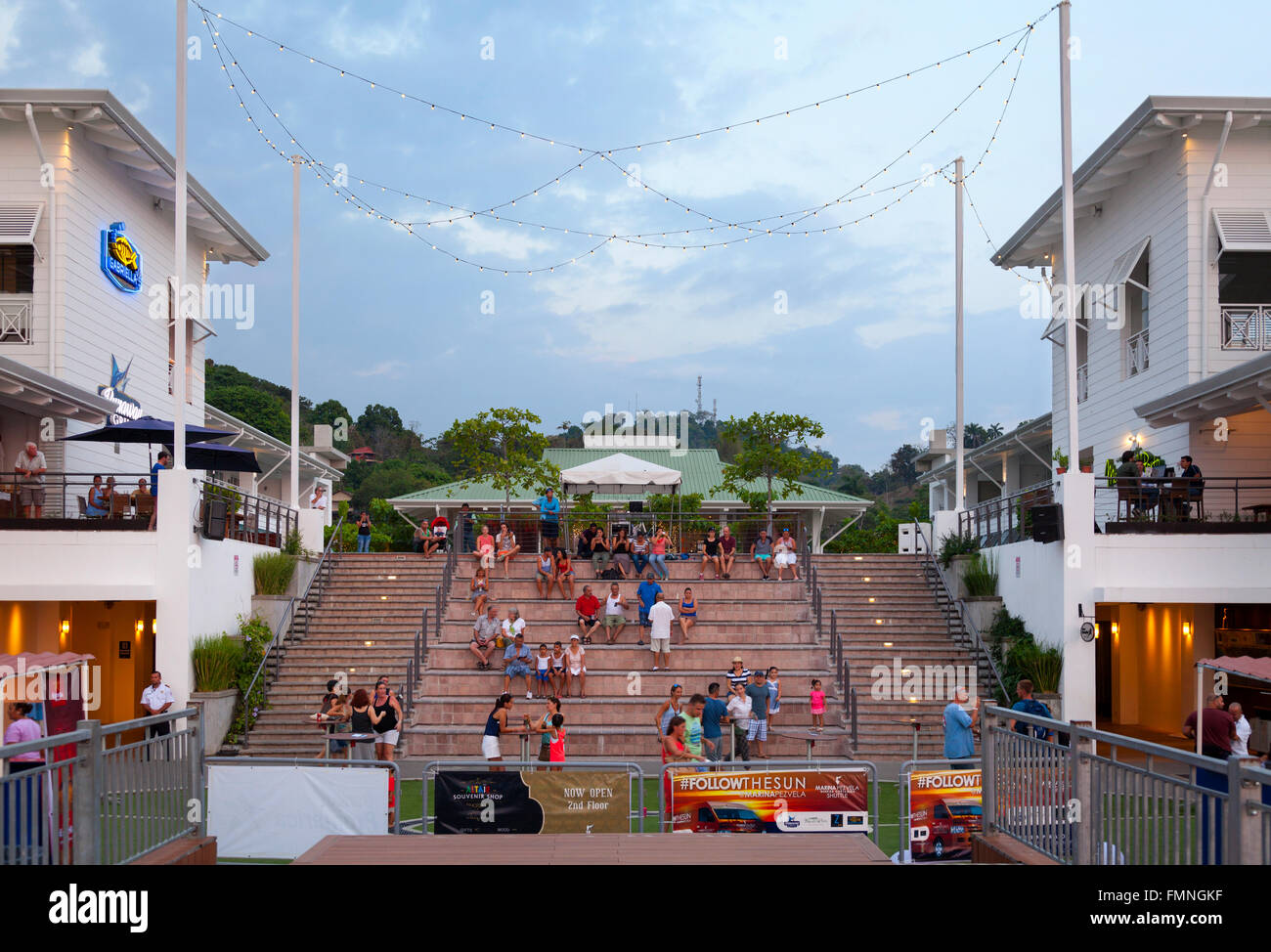People sitting on bleachers in preparation for the festivities of the ...