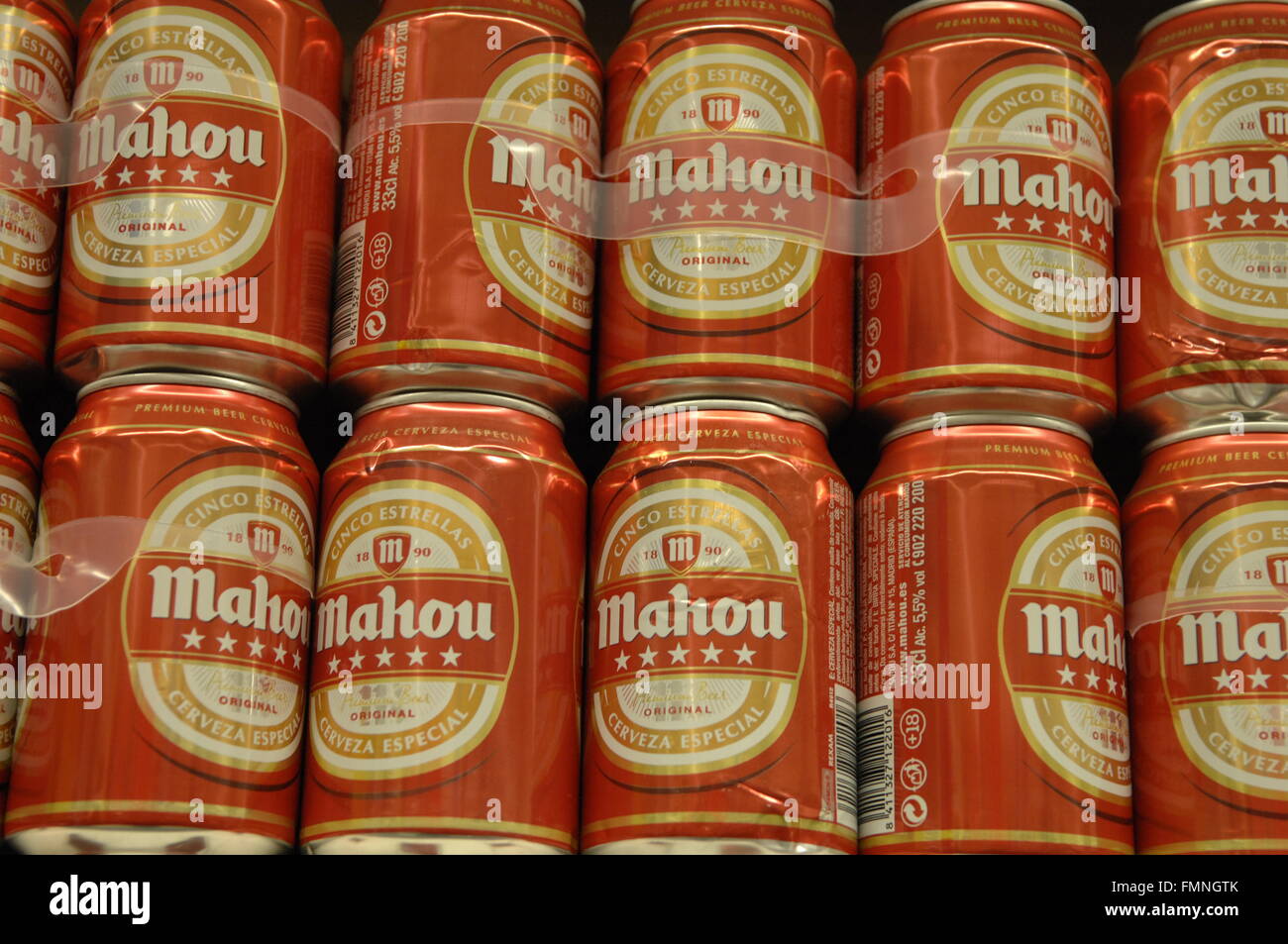 A close up image of 2 rows of mahou cans of beer packs of 6 Stock Photo ...