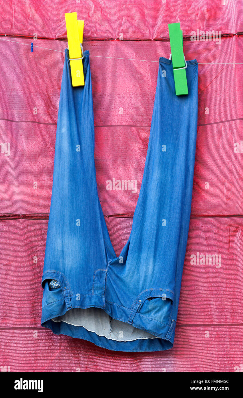 Big jeans drying outdoor Stock Photo - Alamy