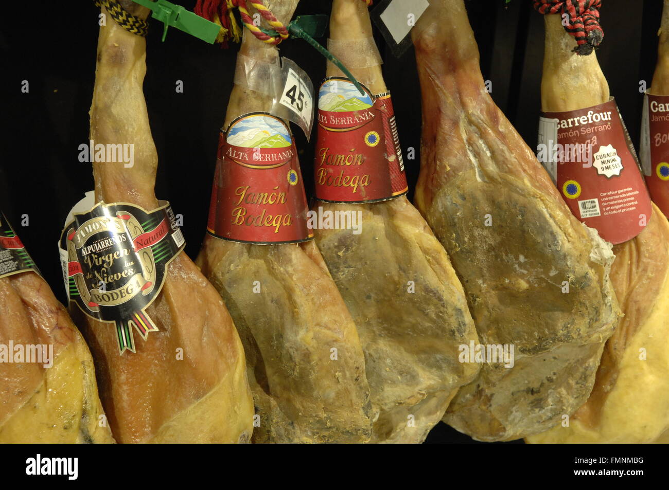 Leg of ham in Carrefour Malaga - Spain Stock Photo - Alamy