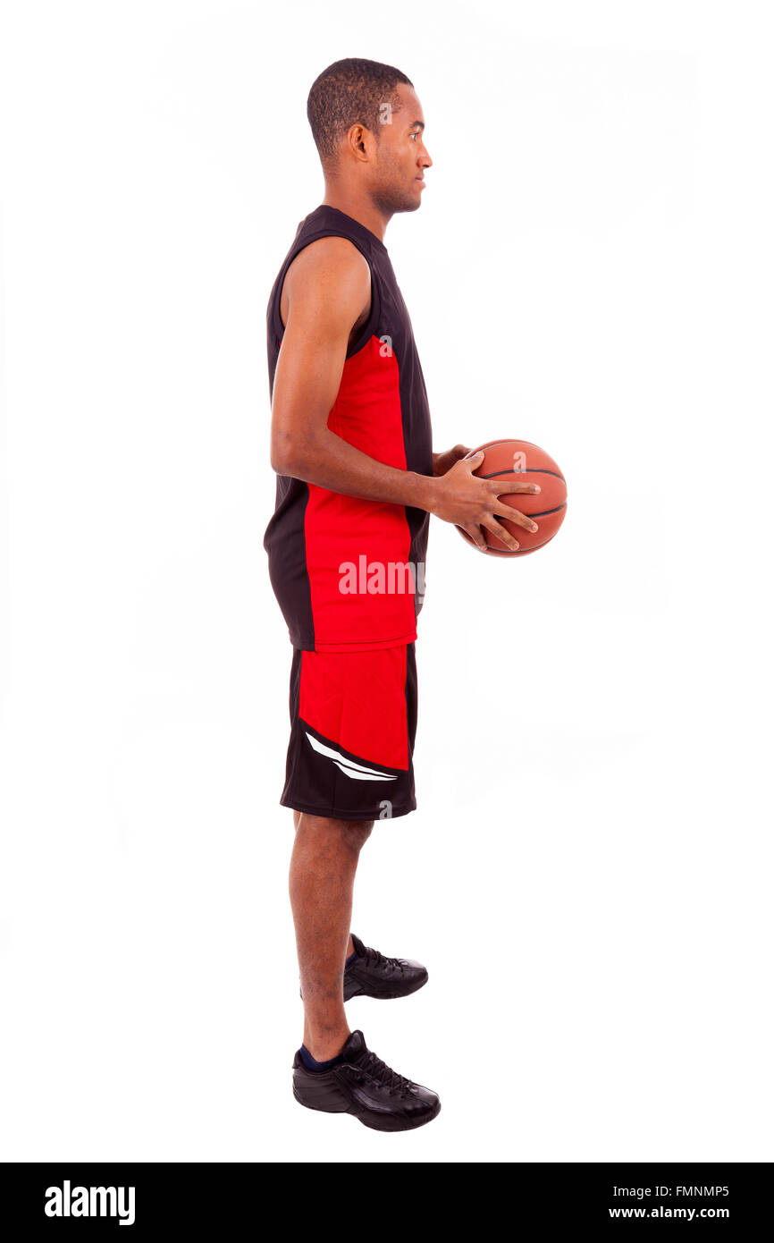 Side view of a basketball player isolated in white background Stock ...