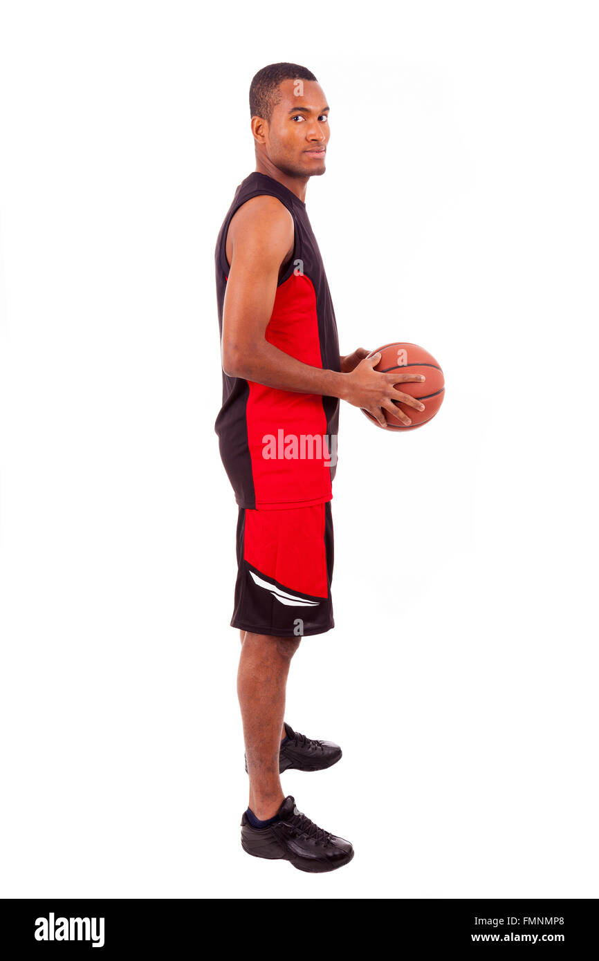 Side view of a basketball player isolated in white background Stock ...