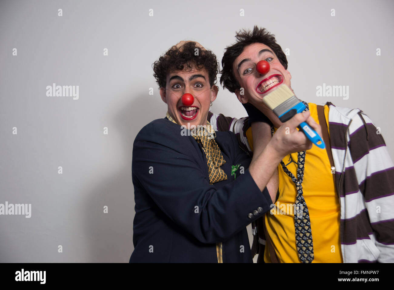 Two clowns performing Stock Photo - Alamy