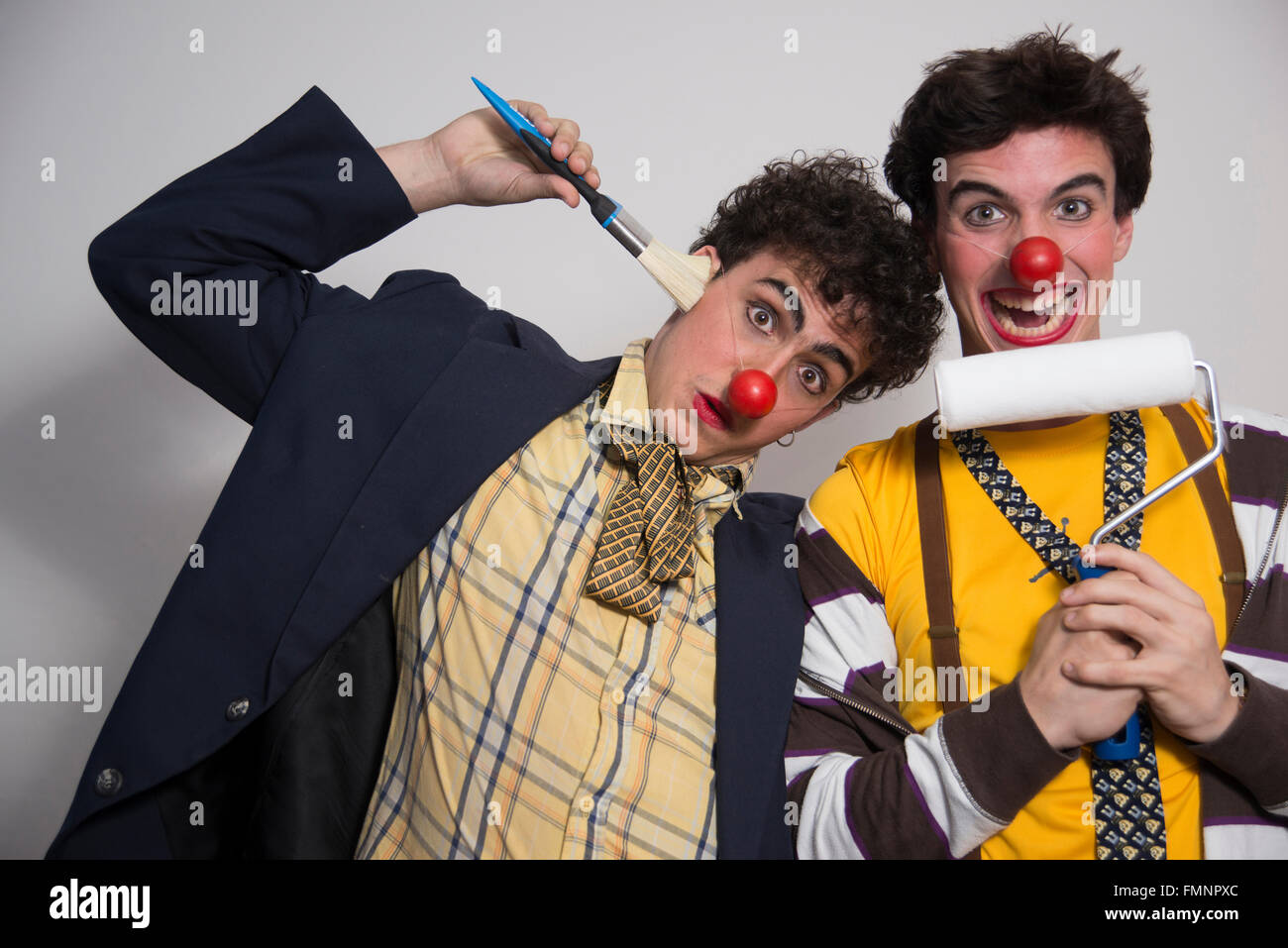 Two clowns performing Stock Photo - Alamy