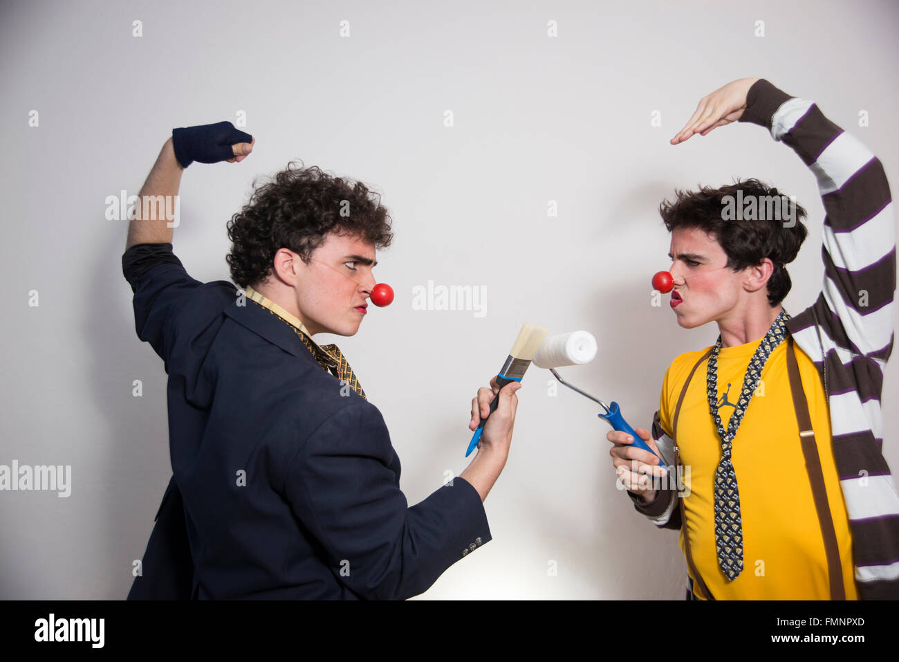 Two clowns fighting hi-res stock photography and images - Alamy