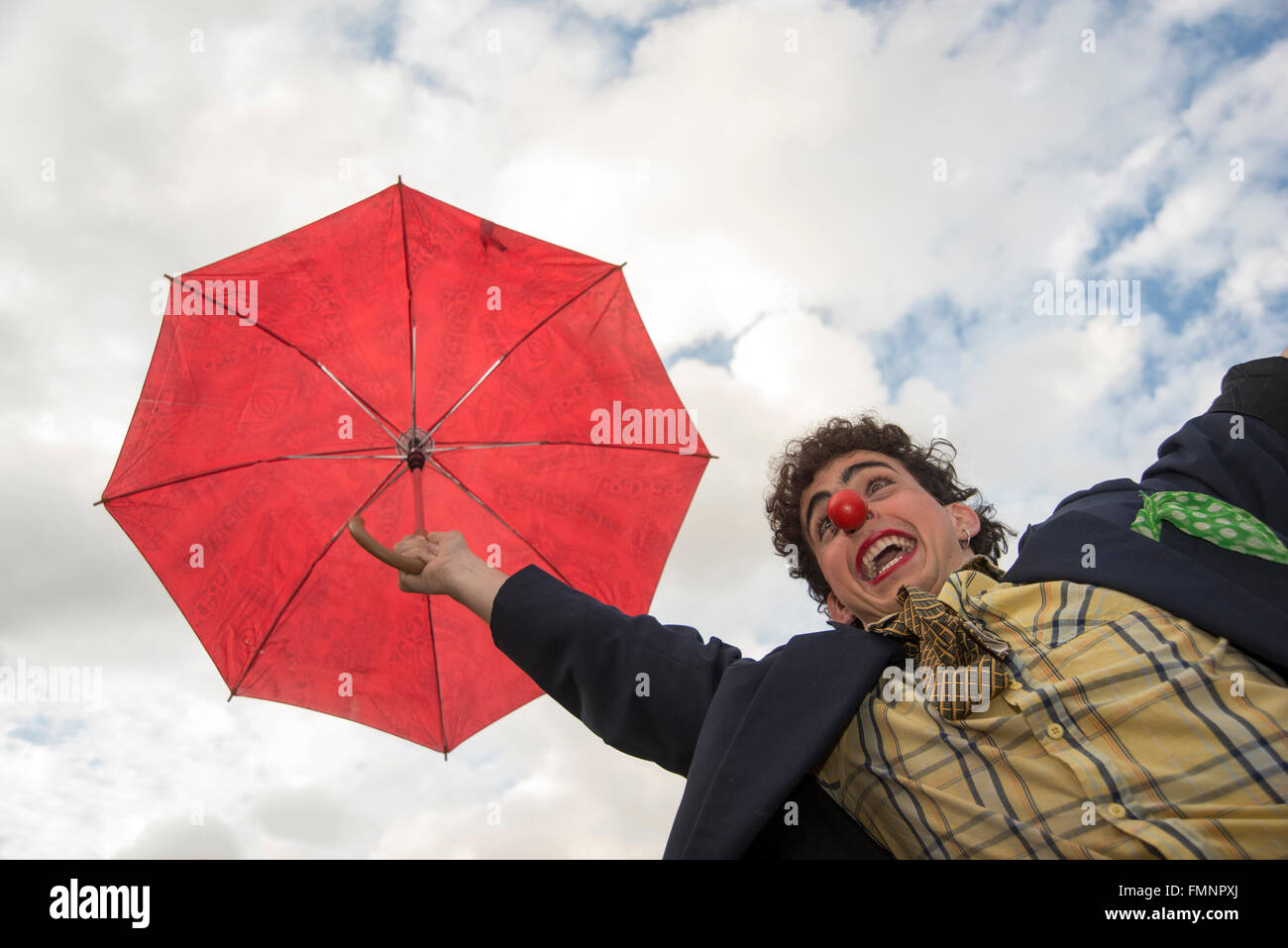 A clown playing outdoors Stock Photo - Alamy