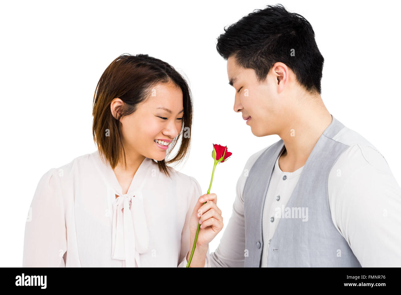 Man giving woman white rose hi-res stock photography and images - Alamy