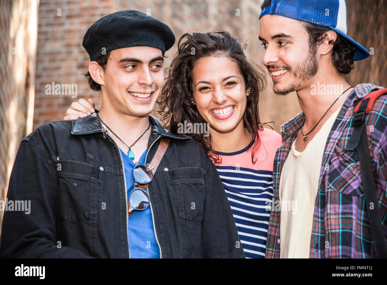 Three college students Stock Photo - Alamy