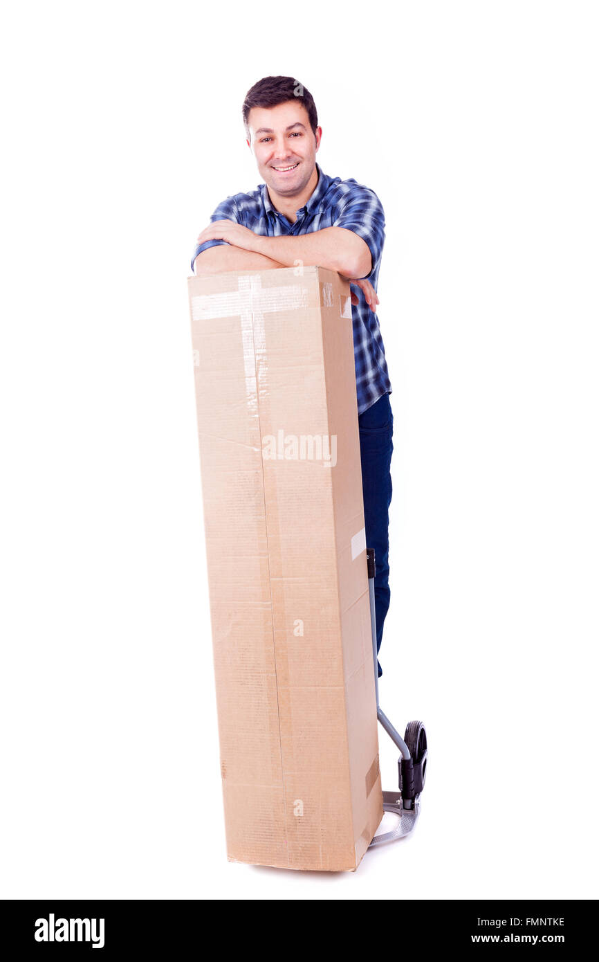 Young man standing with a cardboard box, isolated on white background ...