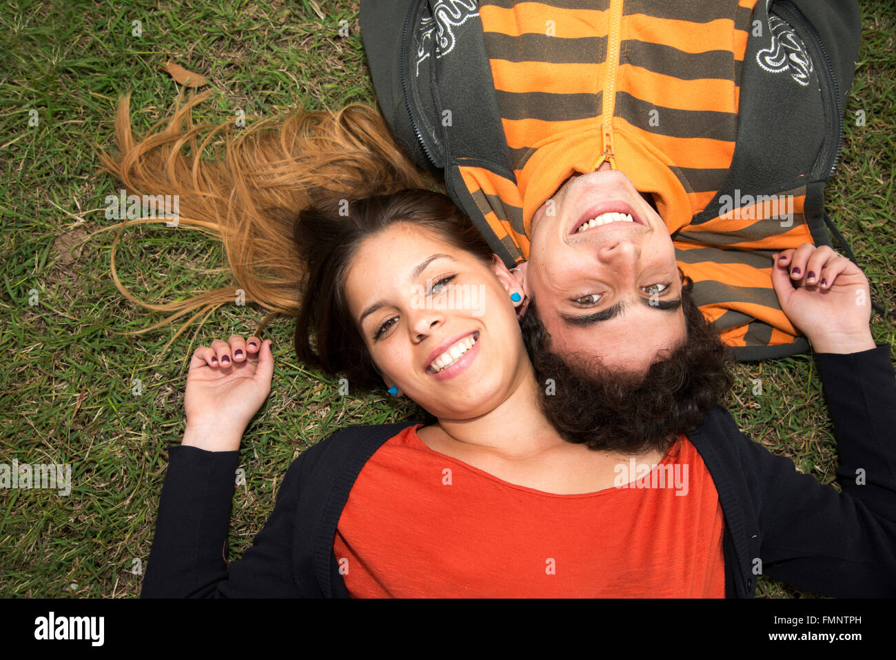 Two college students having good time in the outdoors Stock Photo - Alamy
