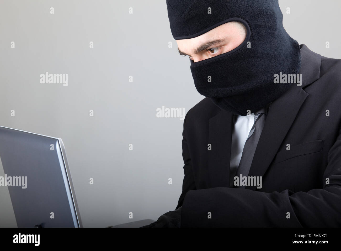 Computer hacker in suit tie hi-res stock photography and images - Alamy