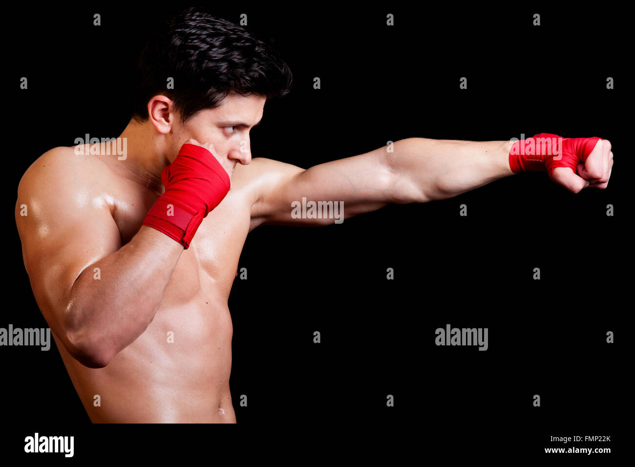 Young Boxer fighter over black background Stock Photo - Alamy