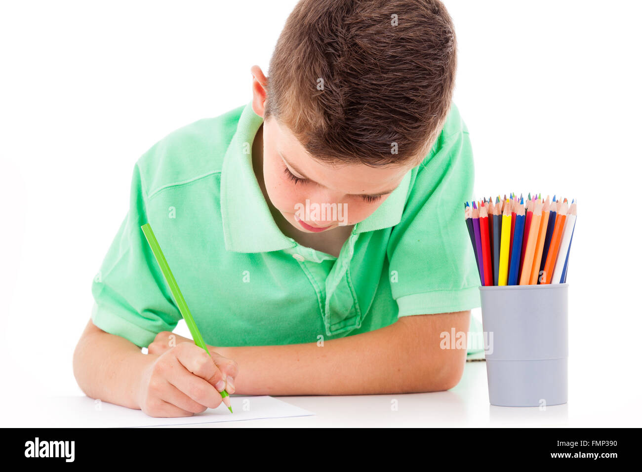 Little boy drawing with colorful crayons, isolated over white Stock ...