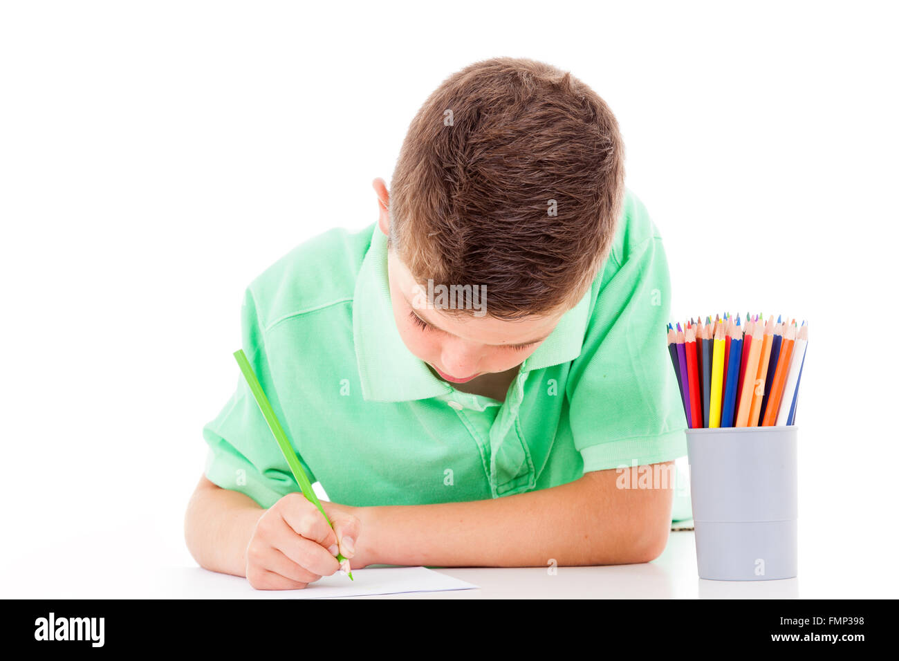 Little boy drawing with colorful crayons, isolated over white Stock ...