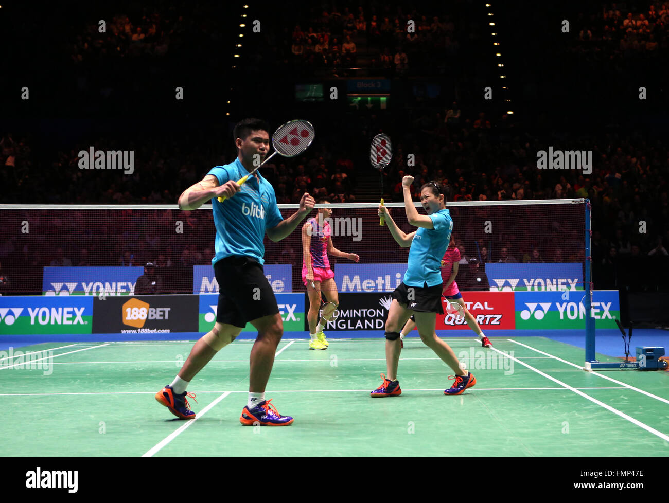 Birmingham, R) of Indonesia celebrate winning the mixed doubles ...