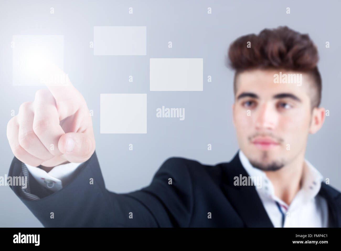 Business man pushing a button on a touch screen interface Stock Photo ...