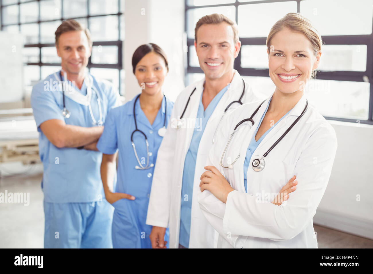 Portrait of medical team standing together Stock Photo - Alamy