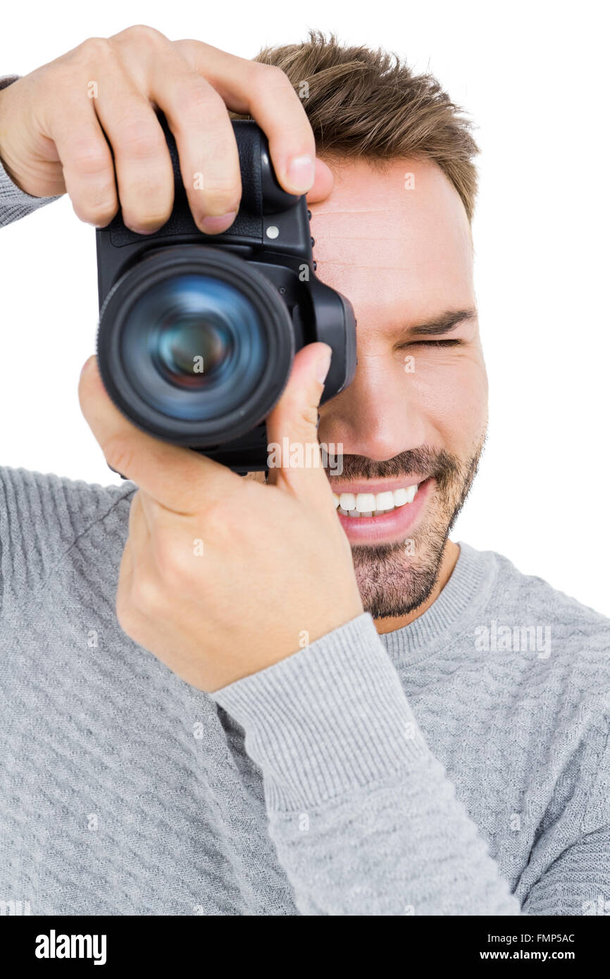 Man photographing with camera Stock Photo - Alamy